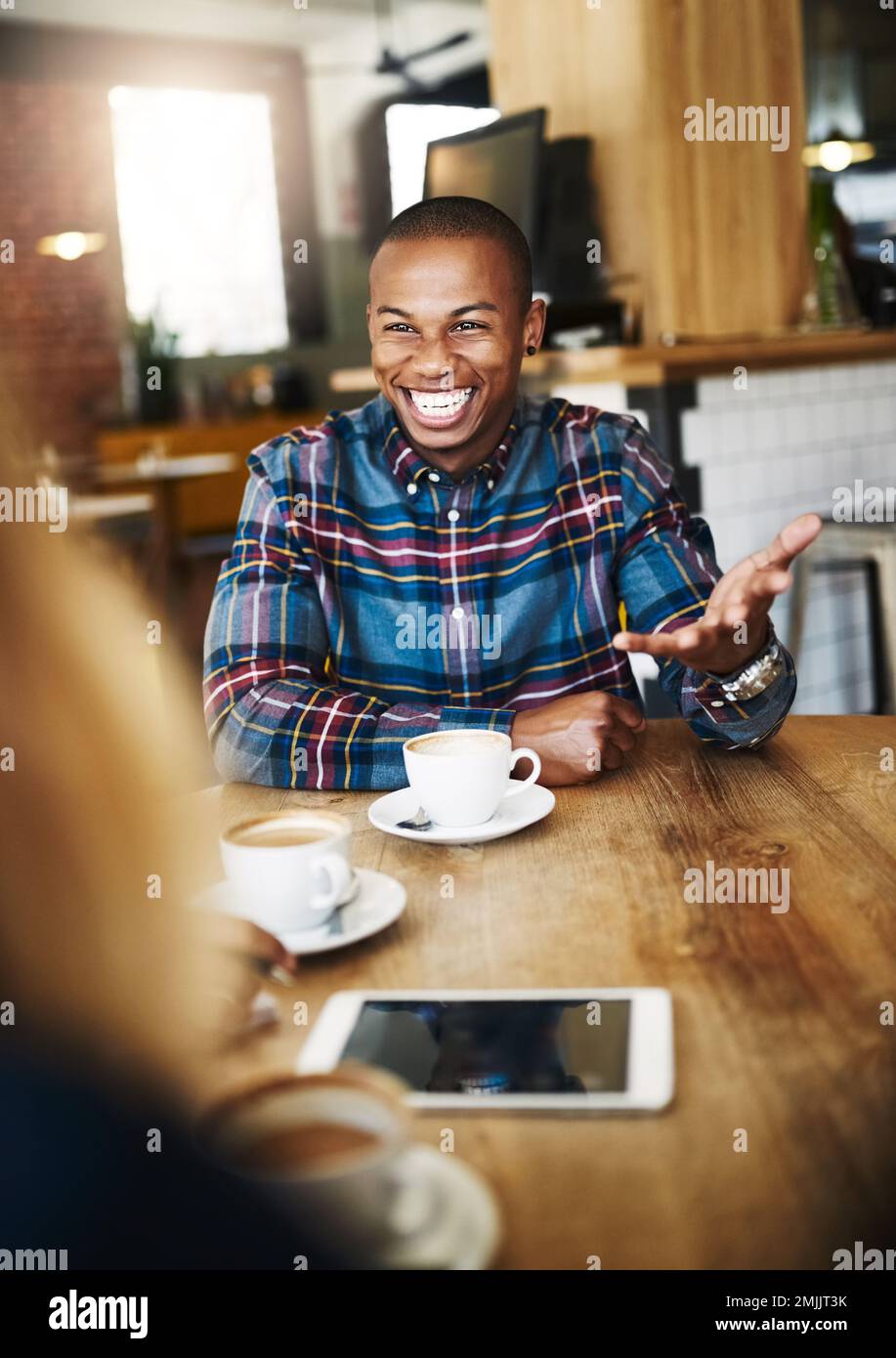 Cheerful friends having break coffee hi-res stock photography and ...