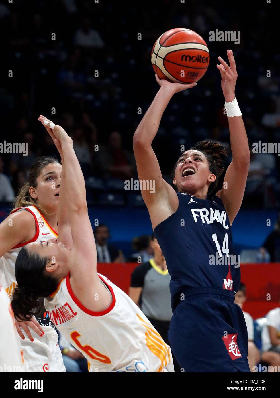 France's Bria Hartley, right, tries to score as Spain's Silvia ...