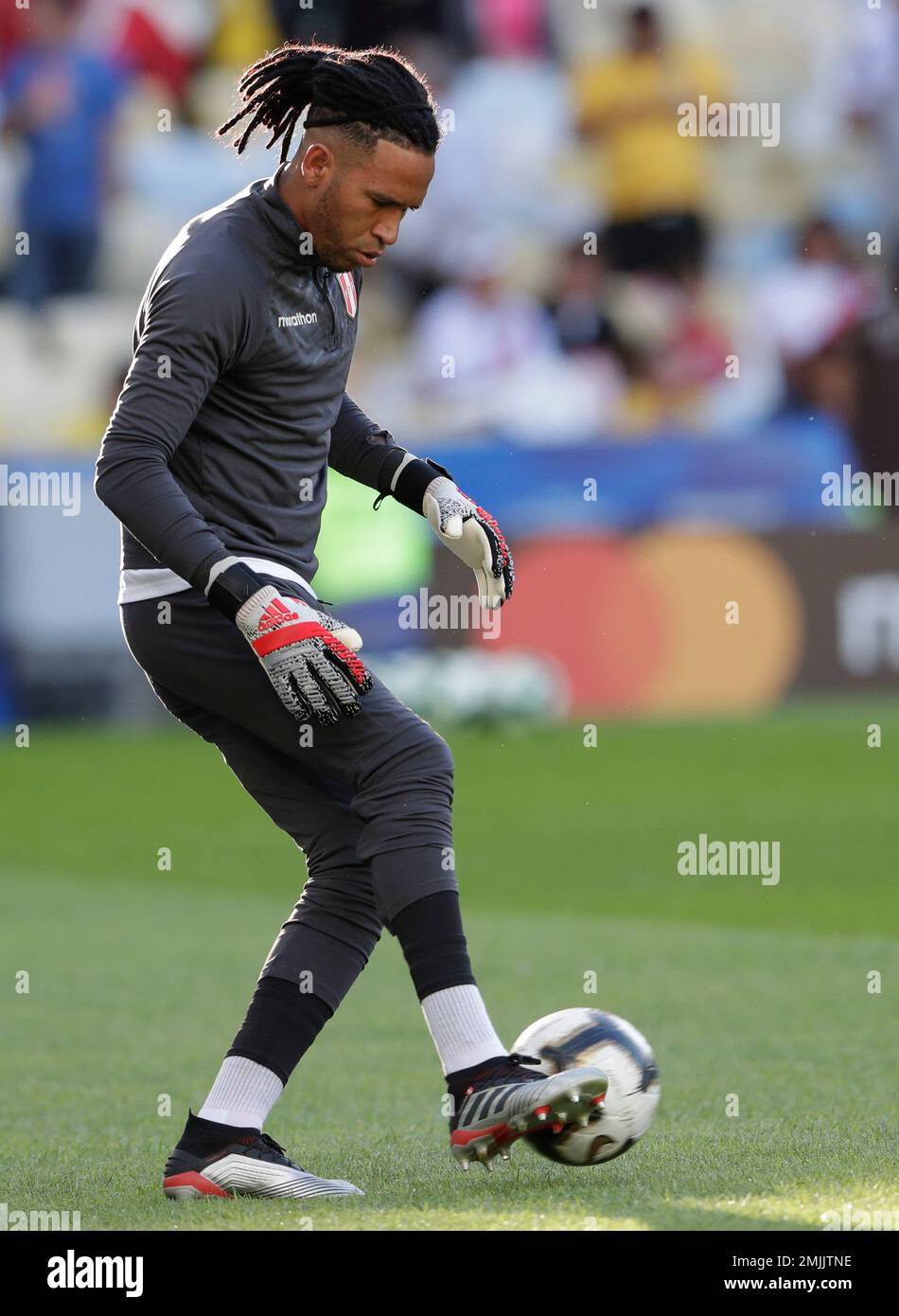 Peru's goalkeeper Pedro Gallese warms up prior the final match of the ...