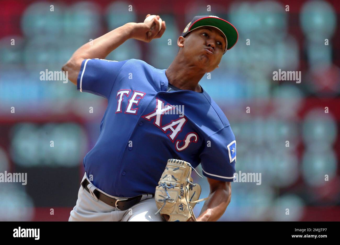 Texas Rangers pitcher Jose Leclerc throws against the Minnesota Twins ...