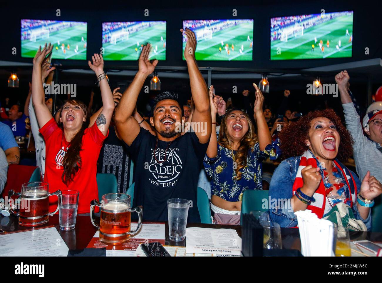 Fans react during a viewing party for the 2019 FIFA Women's World Cup ...