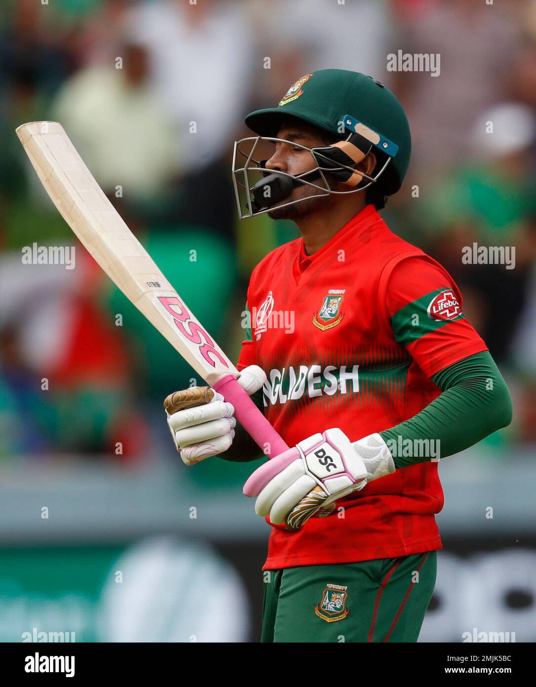 Bangladesh's Mushfiqur Rahim walks off the pitch after being clean ...