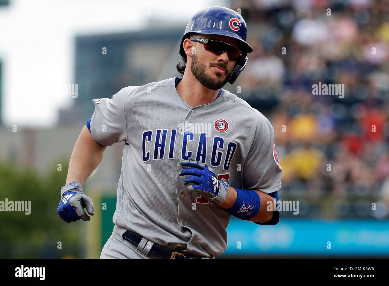 Chicago Cubs' Kris Bryant rounds third after hitting a solo home run ...