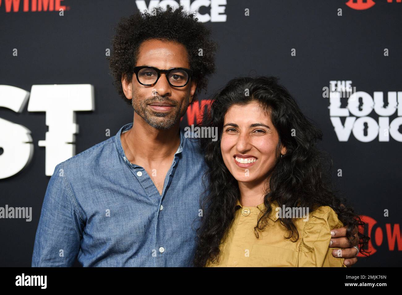 Writer Touré, left, and wife Rita Nakouzi attend the premiere of the ...