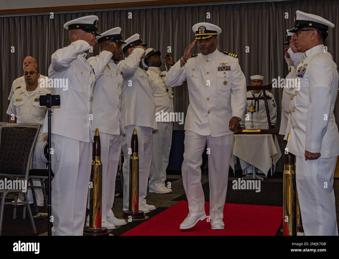 Capt. David Adams, Commander, Fleet Activities Sasebo (CFAS), is piped ...