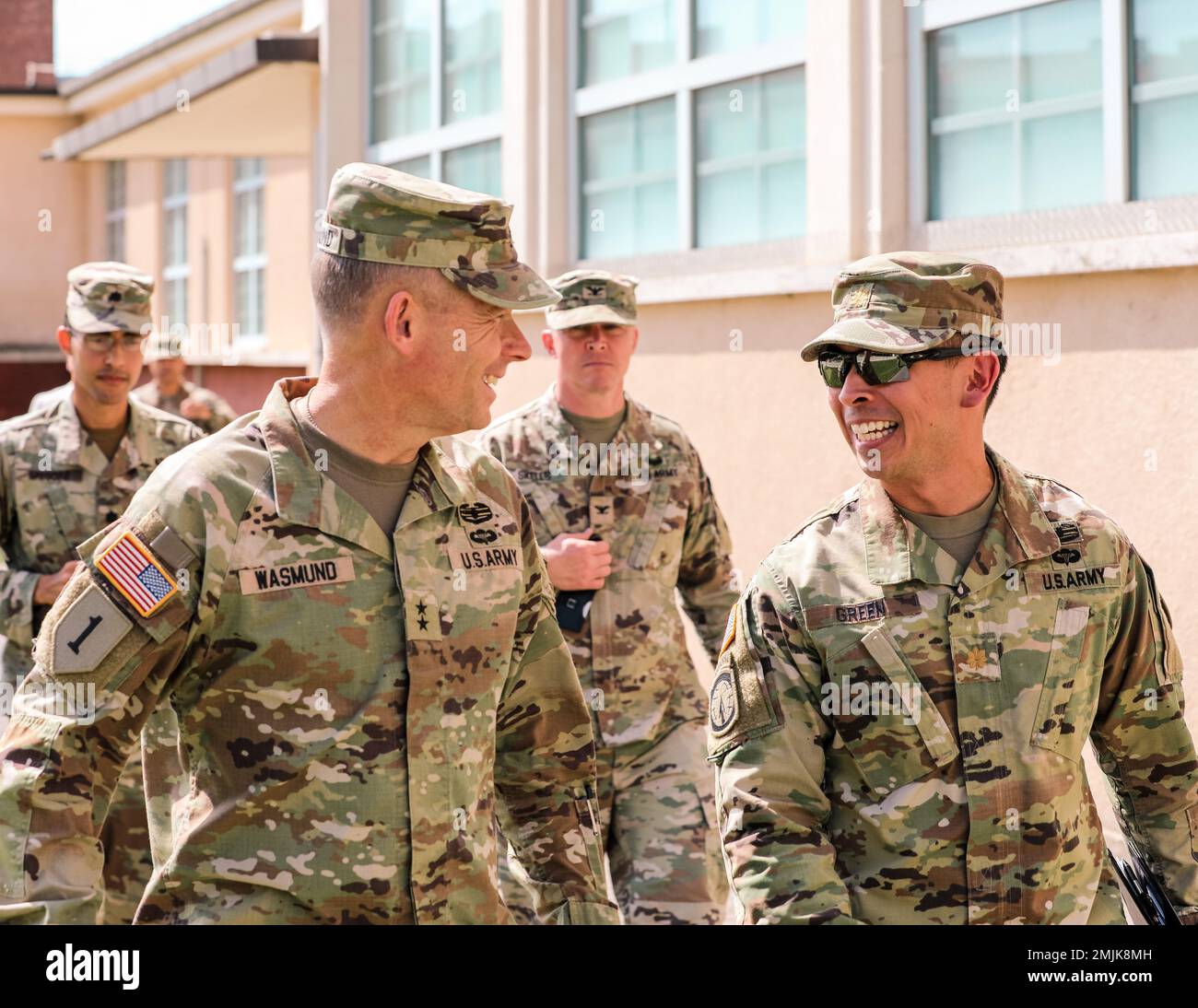 Maj. James Green, 207th Military Intelligence Brigade, walks with Maj ...