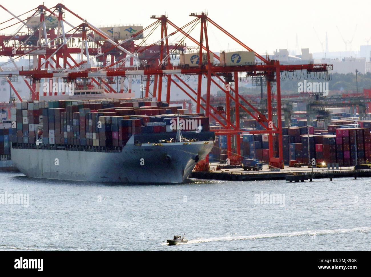 FILE - In this Nov. 14, 2018, file photo, a container ship is docked at ...