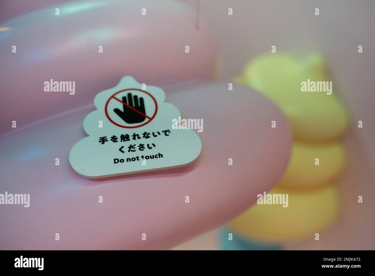 In this Monday, July 1, 2019, photo, a "Do Not Touch" sign in the shape ...