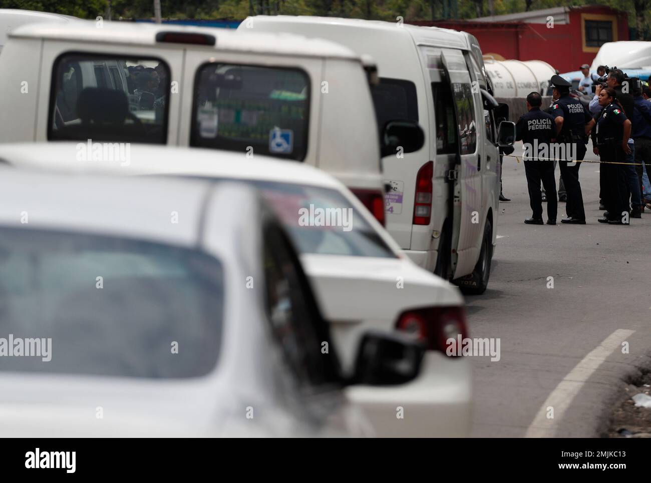 Uniformed federal police block the highway leading from Mexico City ...