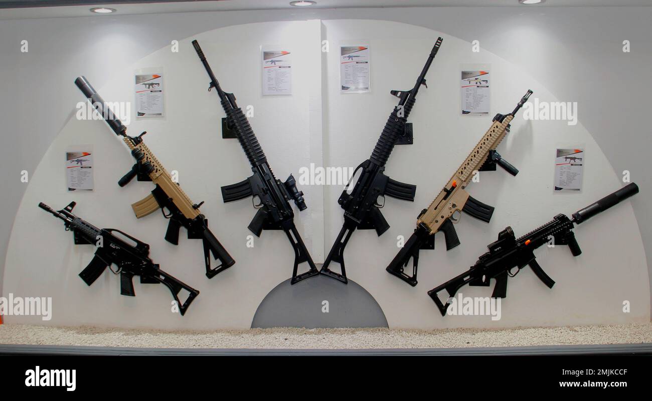 Rows of long-barreled combat weapons produced by PINDAD Indonesia in ...