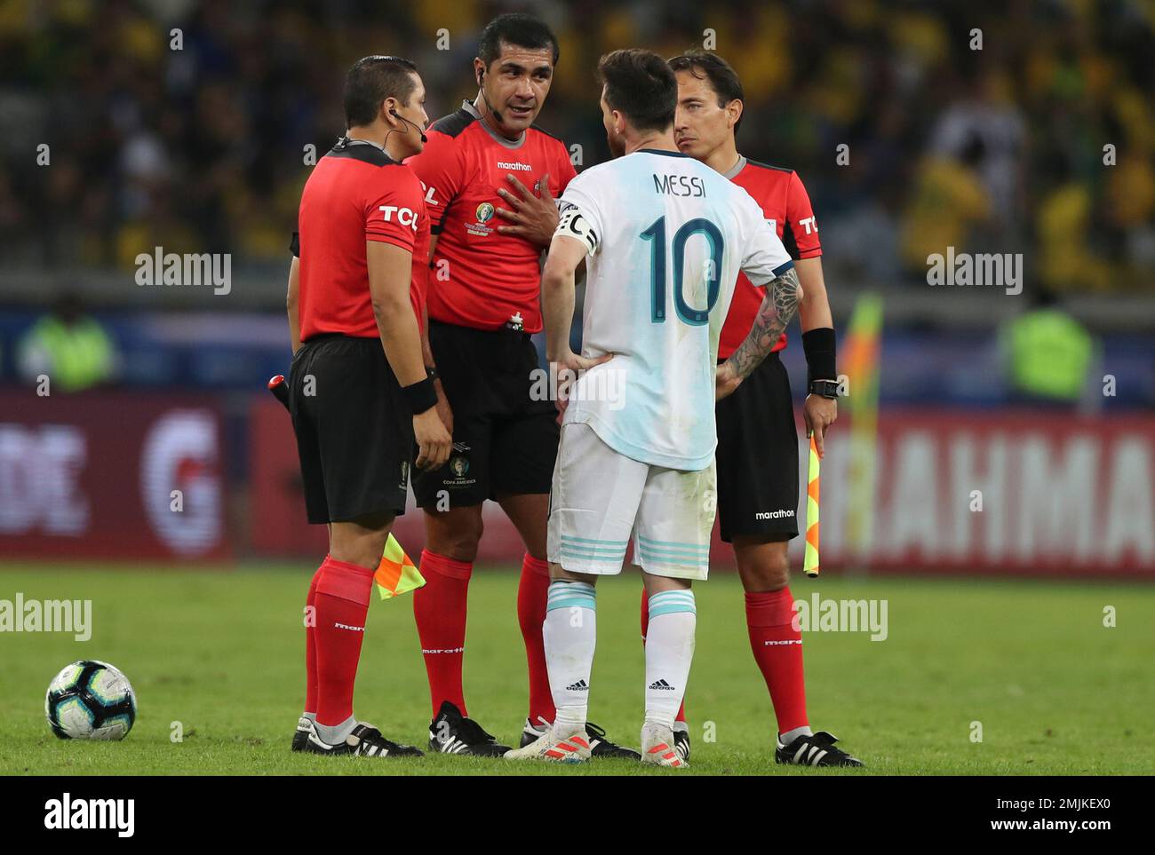 Argentina's Lionel Messi complains with referee Roddy Zambrano, center ...