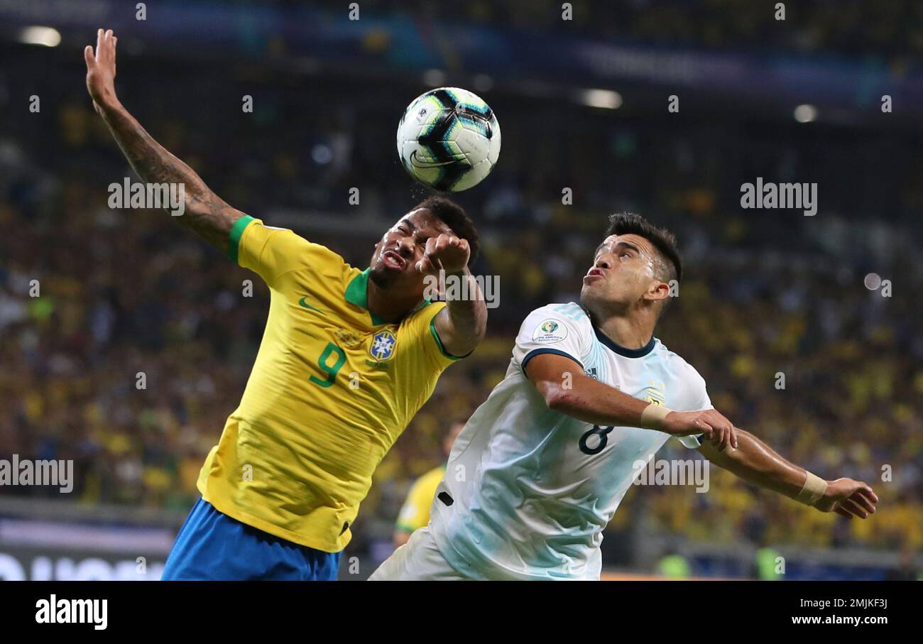 Brazil's Gabriel Jesus, left, and Argentina's Marcos Acuna fights for ...