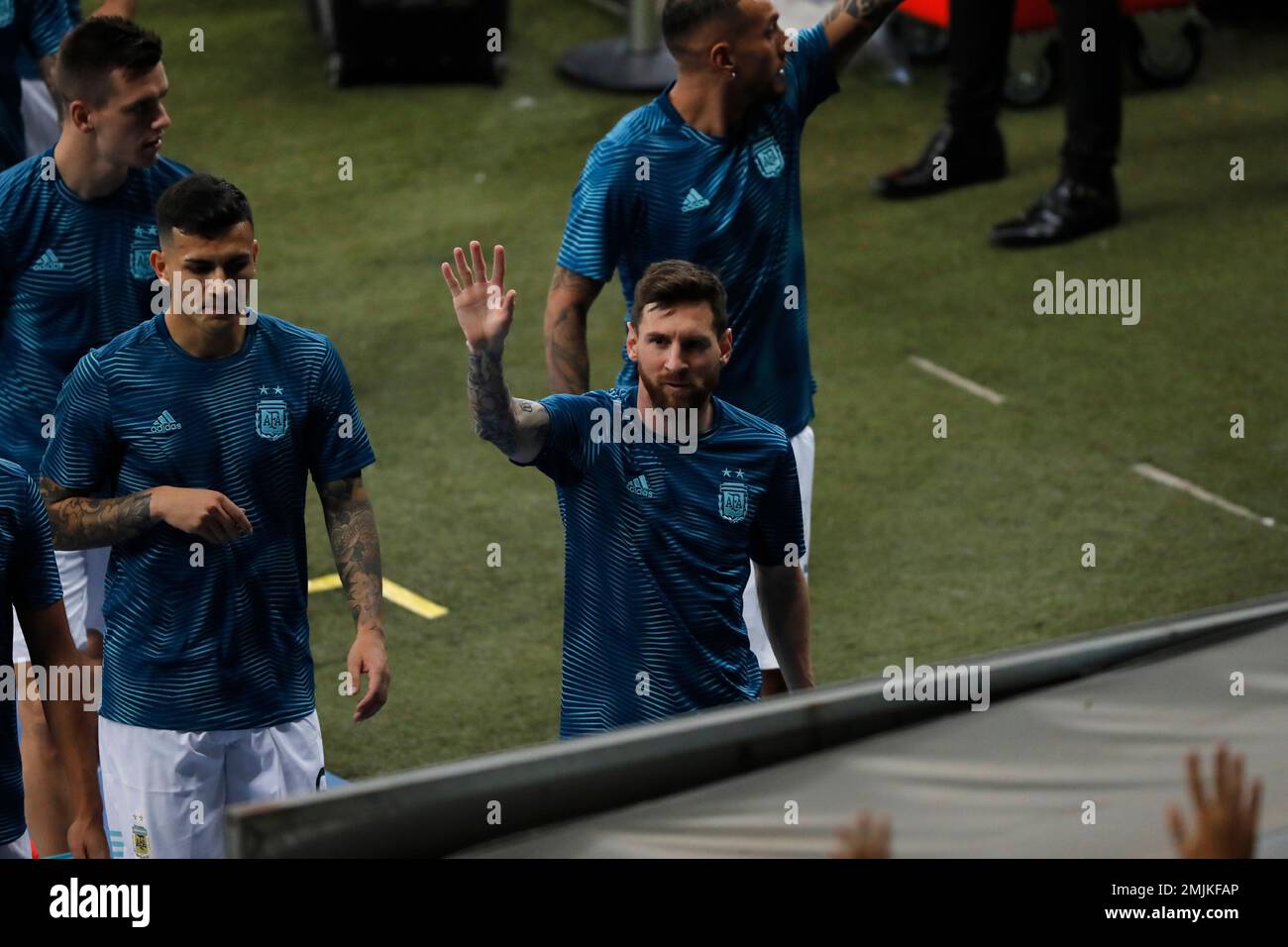 Argentina's Lionel Messi waves to fans as he leaves the field prior to ...