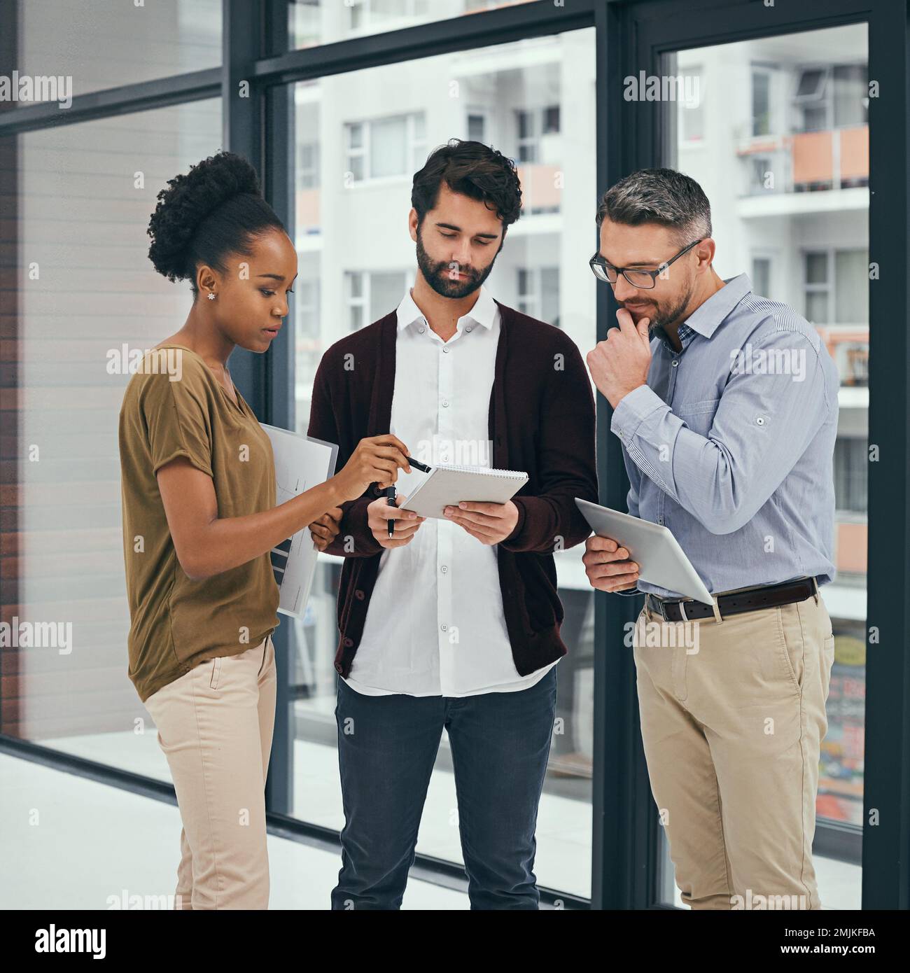 Planning out every detail to perfection. a group of colleagues having a ...