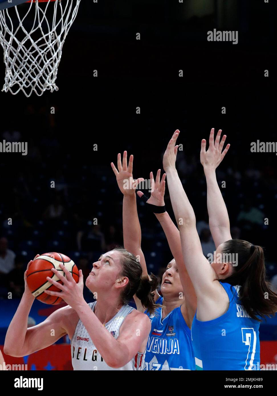 Belgium's Emma Meesseman, left, tries to score as Slovenia's Zala ...