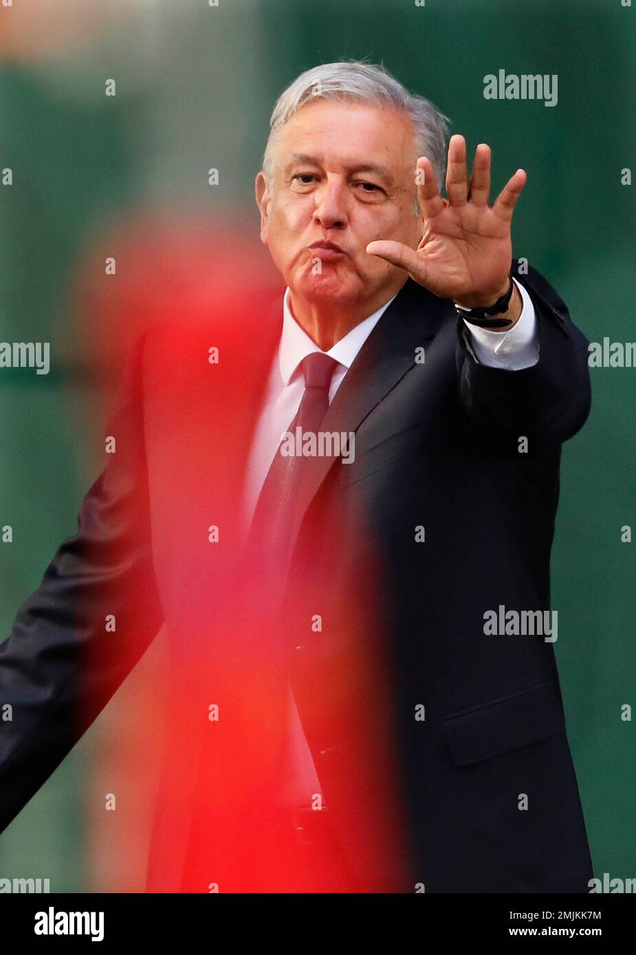 Mexico's President Andres Manuel Lopez Obrador waves to the crowd at ...