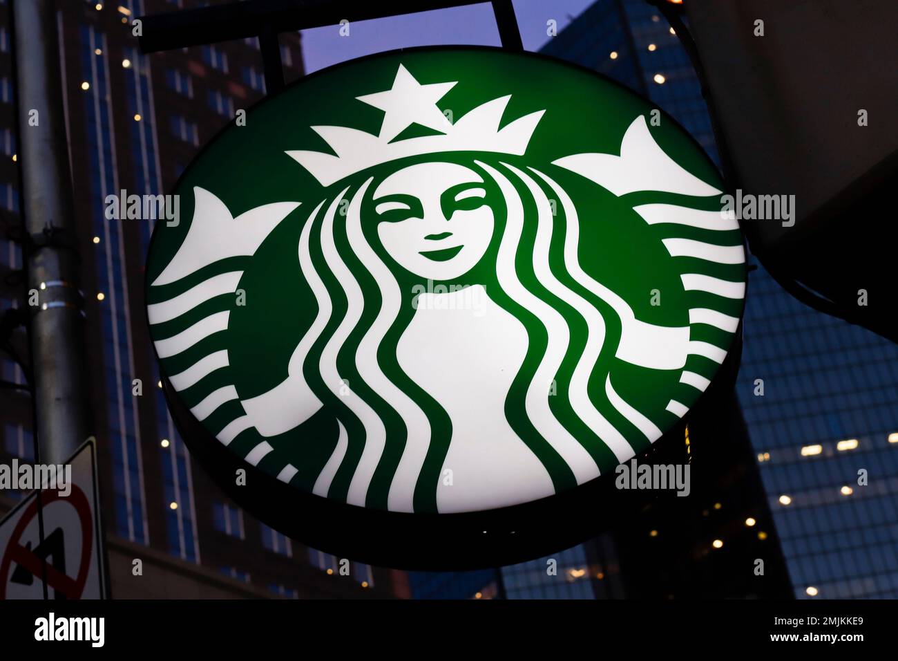 This is the Starbucks sign outside a Starbucks coffee shop in downtown ...