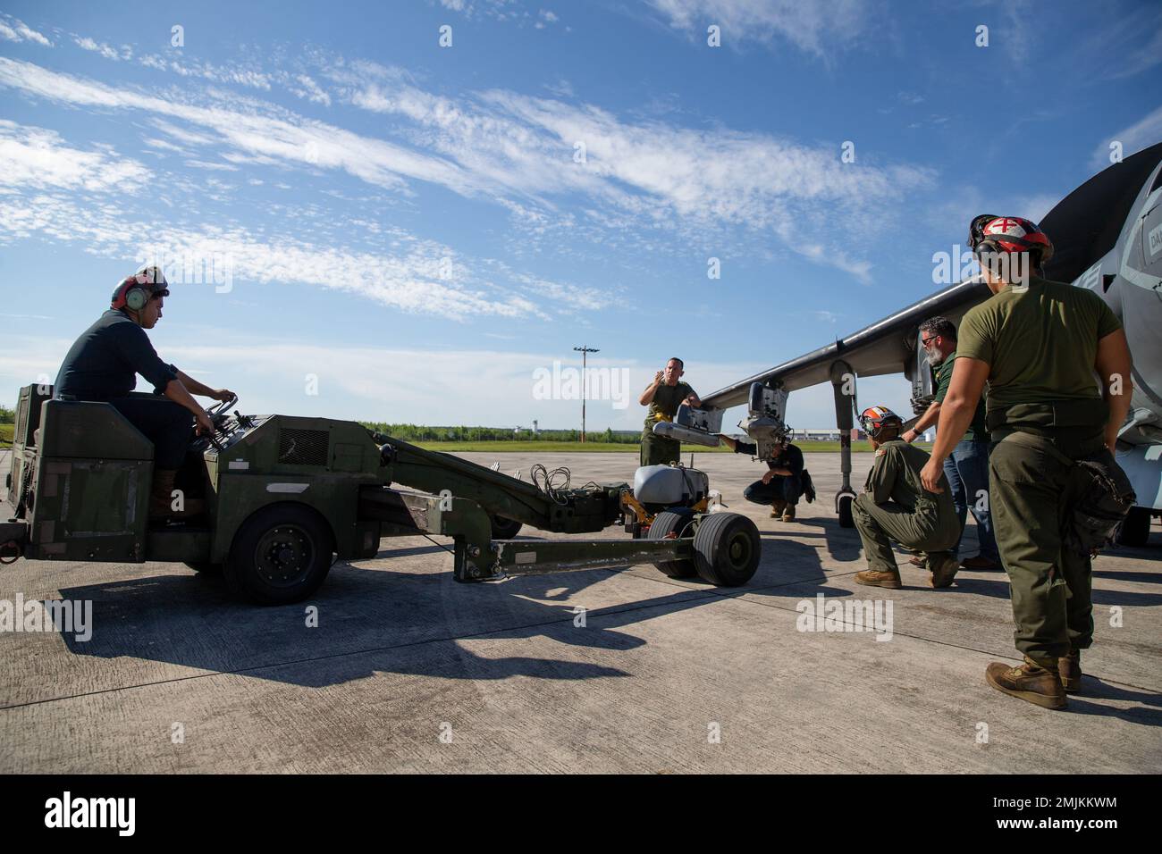 U.S. Marines with Marine Attack Squadron (VMA) 223 prepare to load an ...