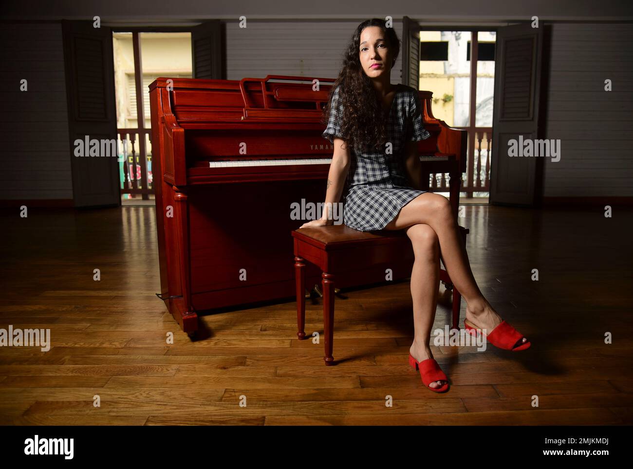 In this May 30, 2019 photo, Puerto Rican singer Ileana Cabra, also ...