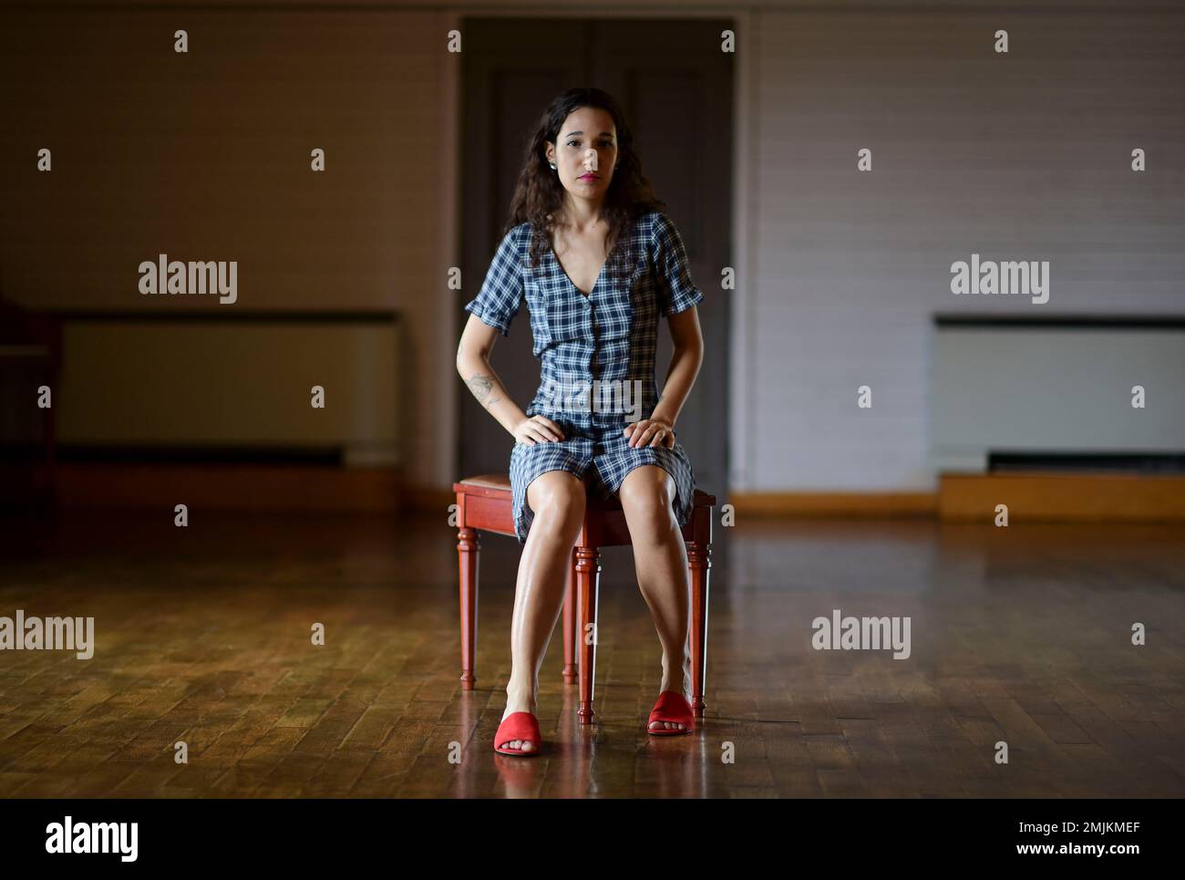 In this May 30, 2019 photo, Puerto Rican singer Ileana Cabra, also ...