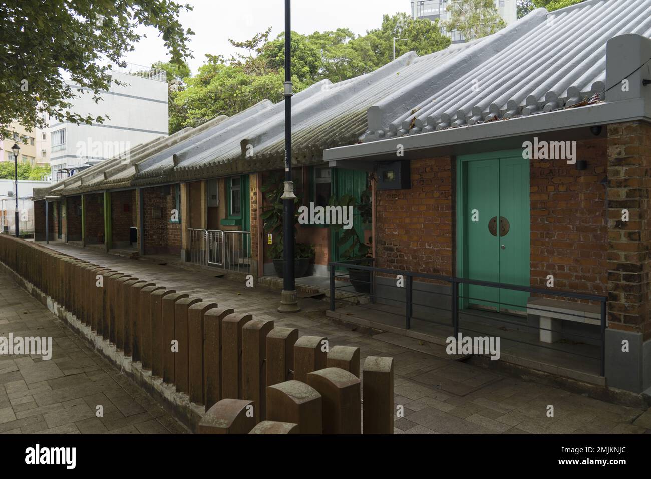 Pat Kan Uk Houses in Stanley, an eight-unit huts with tiled gable roofs ...