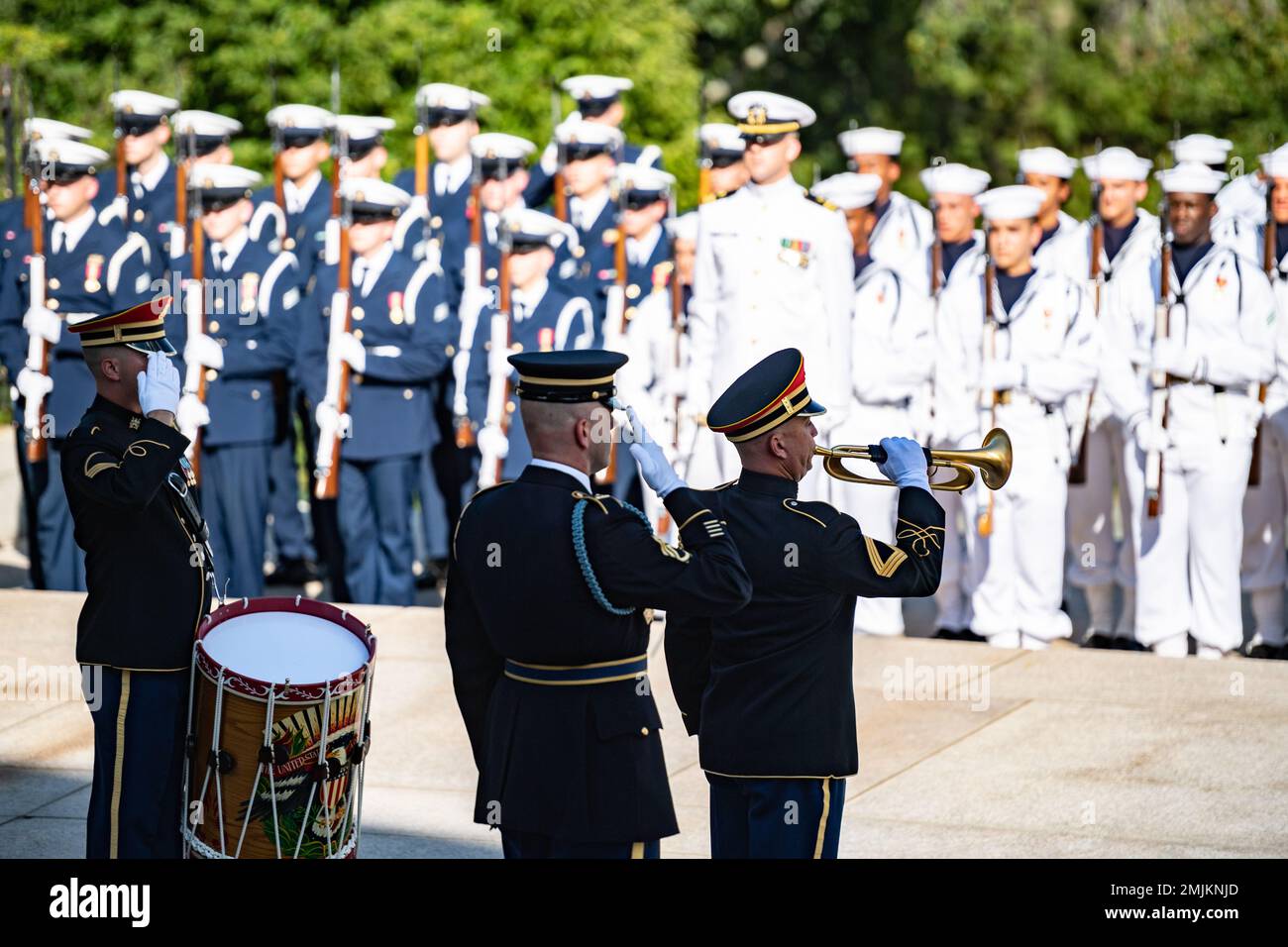 A bugler from the U.S. Army Band, Pershing's Own, plays "Taps" during ...