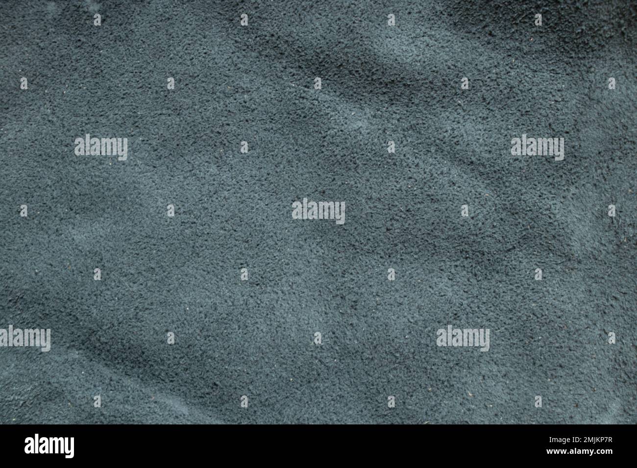 dark gray genuine suede leather as background Stock Photo - Alamy