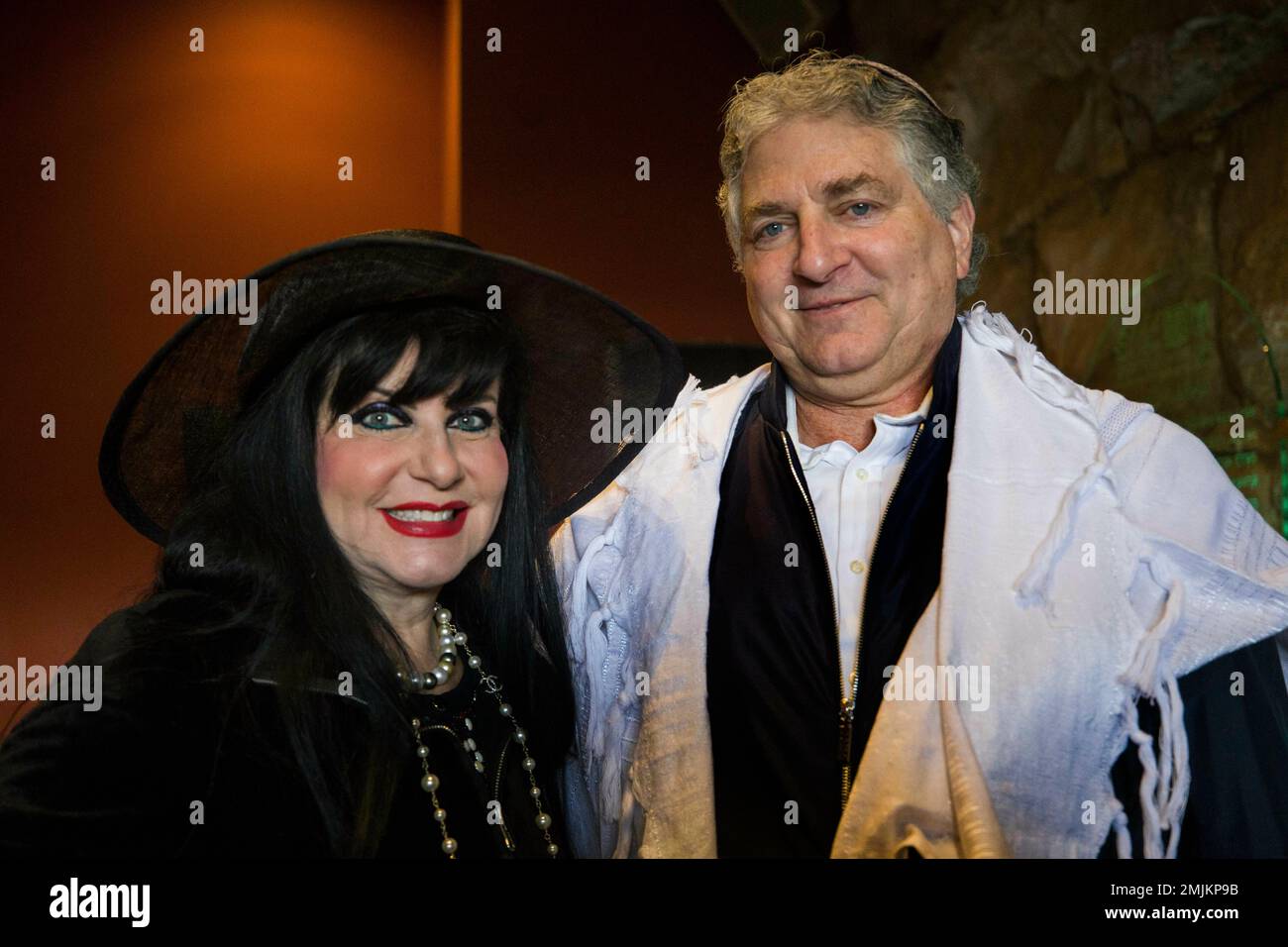 In this April 22, 2019 photo, Simon and Jana Falic pose for a photo as ...