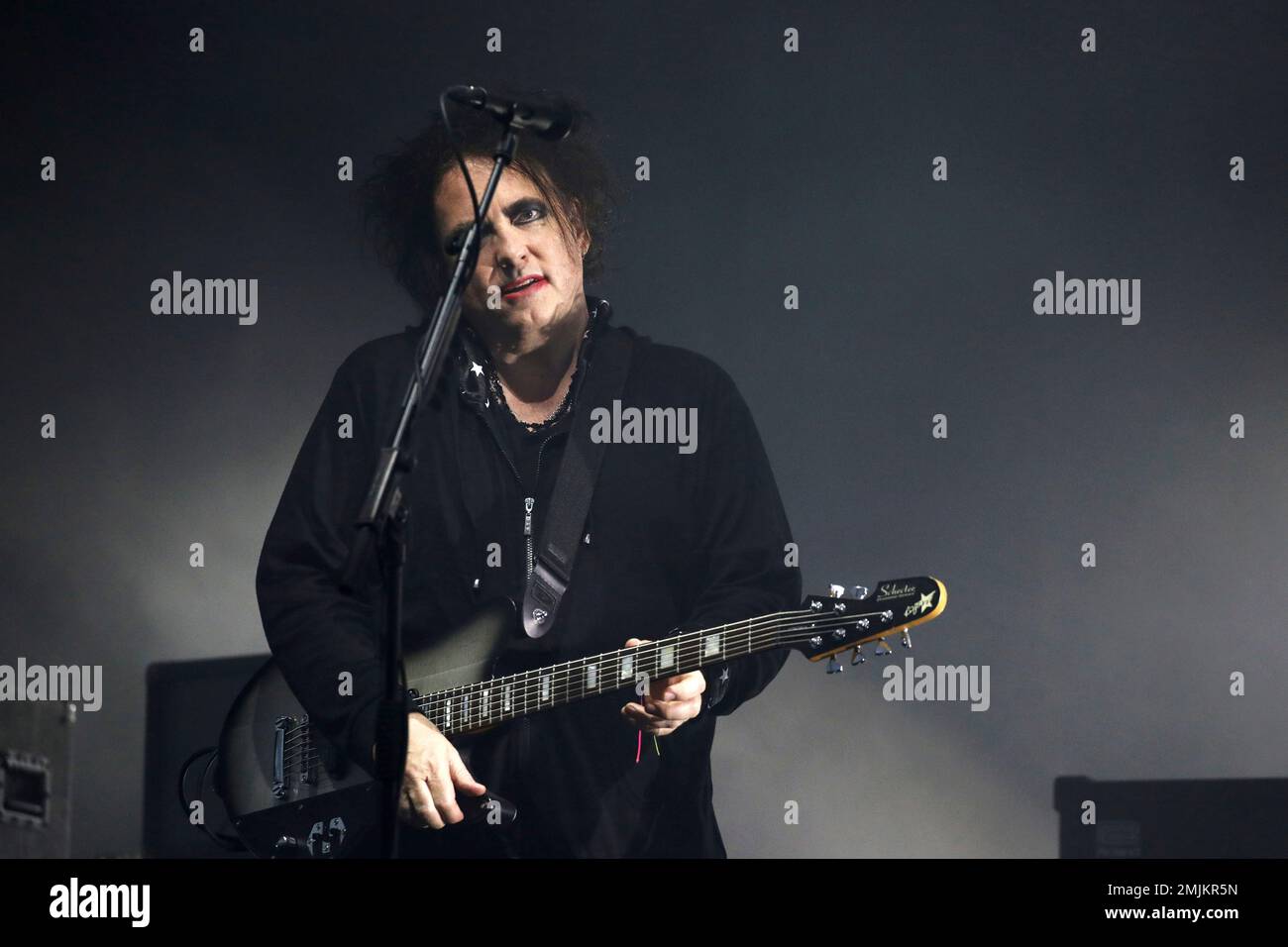 Musician Robert Smith performs with his band The Cure on the Pyramid ...