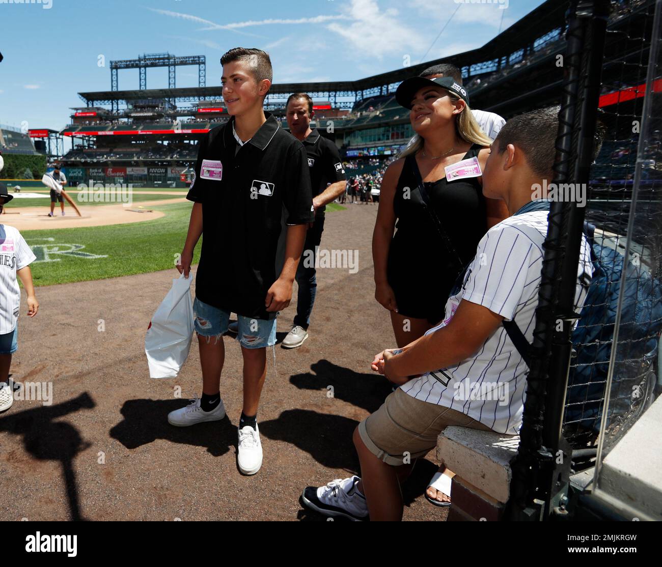 Thirteen-year-old Josh Cordova, front, of Denver, joins Major League ...