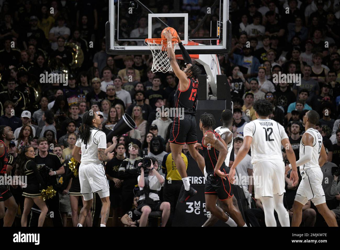 Houston forward J'Wan Roberts (13) dunks during the second half of an ...