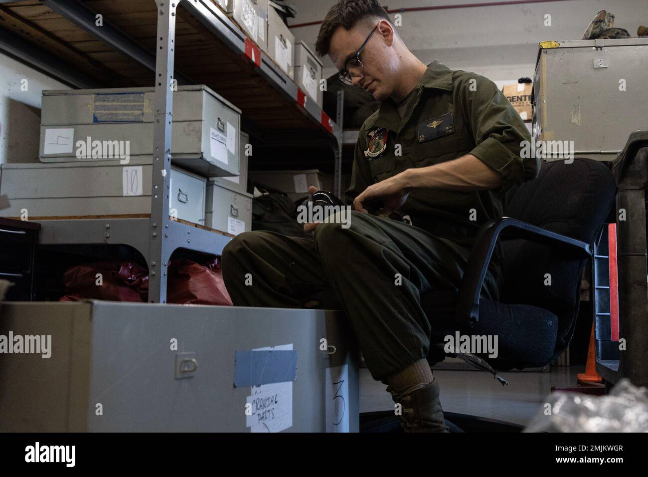 U.S. Marine Corps Pfc. Kyle Frew, a flight equipment technician with ...