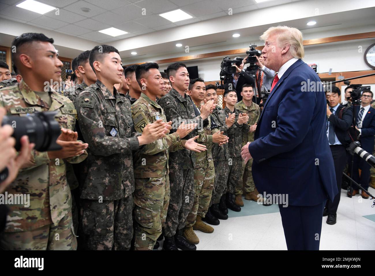 President Donald Trump talks to troops at the Korean Demilitarized Zone ...