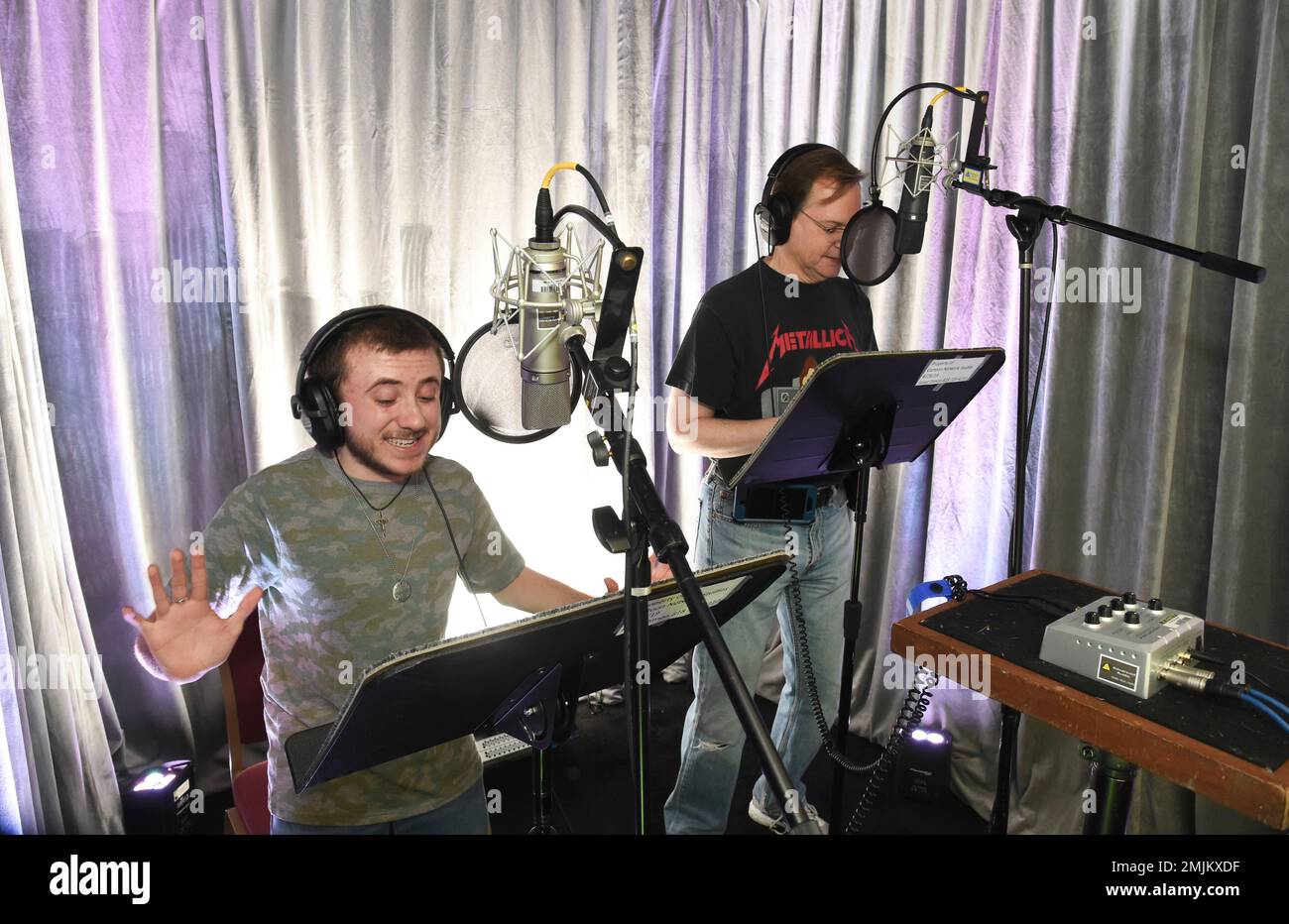 Atticus Shaffer and Richard Honig practice voice over skills during It ...