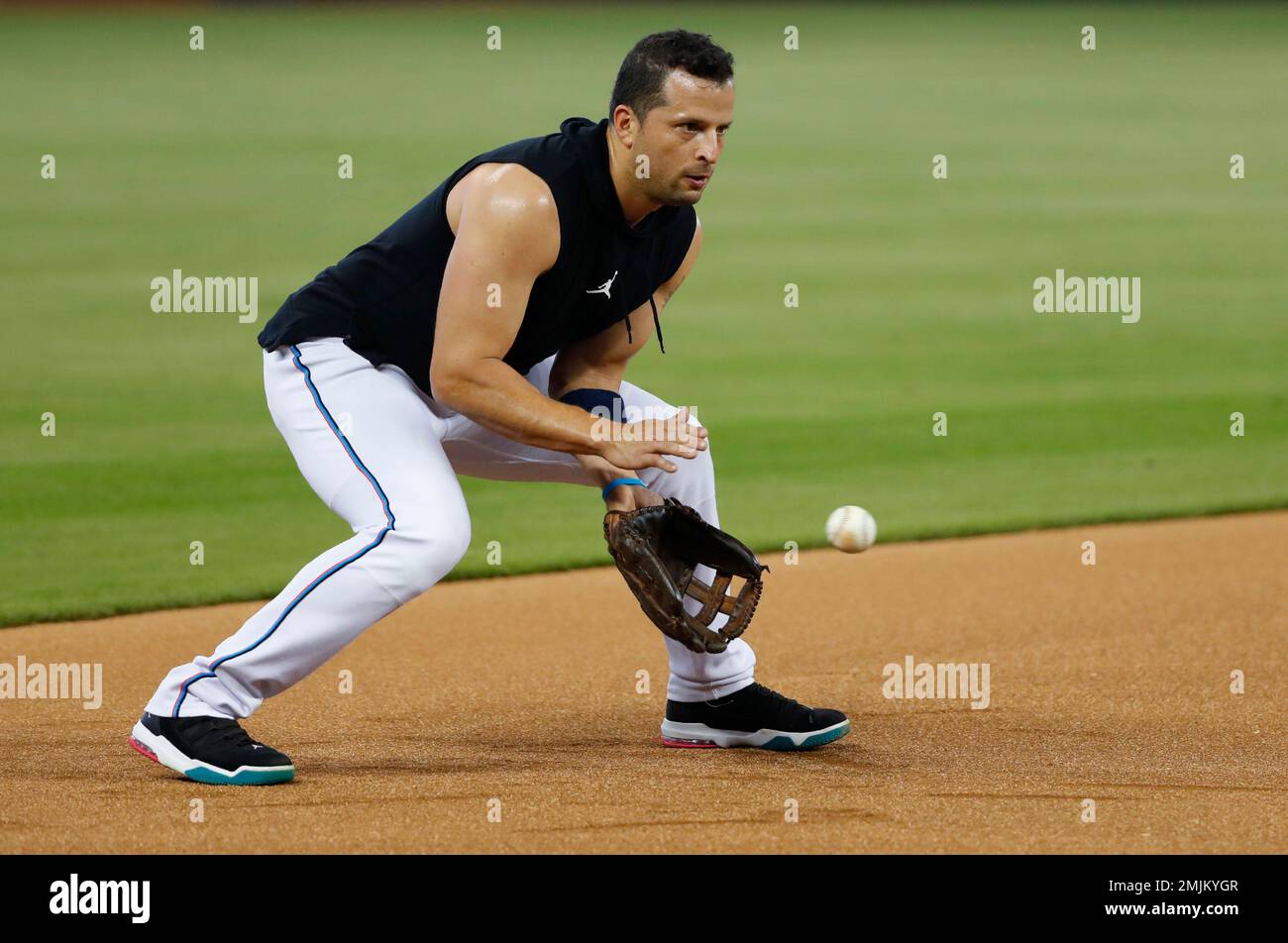 Miami Marlins' Martin Prado fields a ball during practice before the ...
