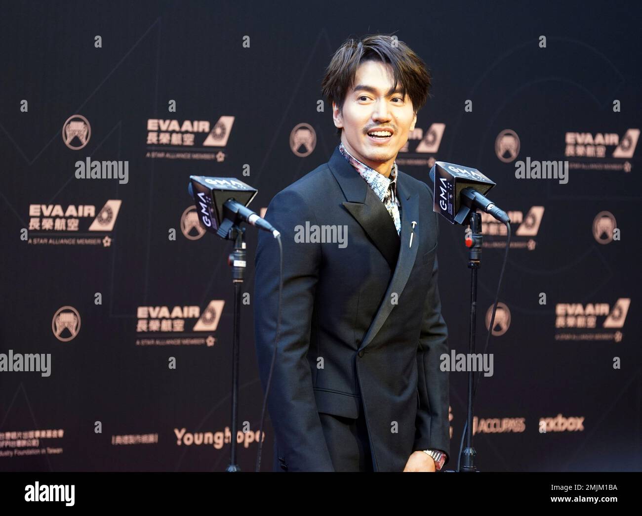 Taiwanese singer and actor Jerry Yan smiles as he arrives at the 30th ...