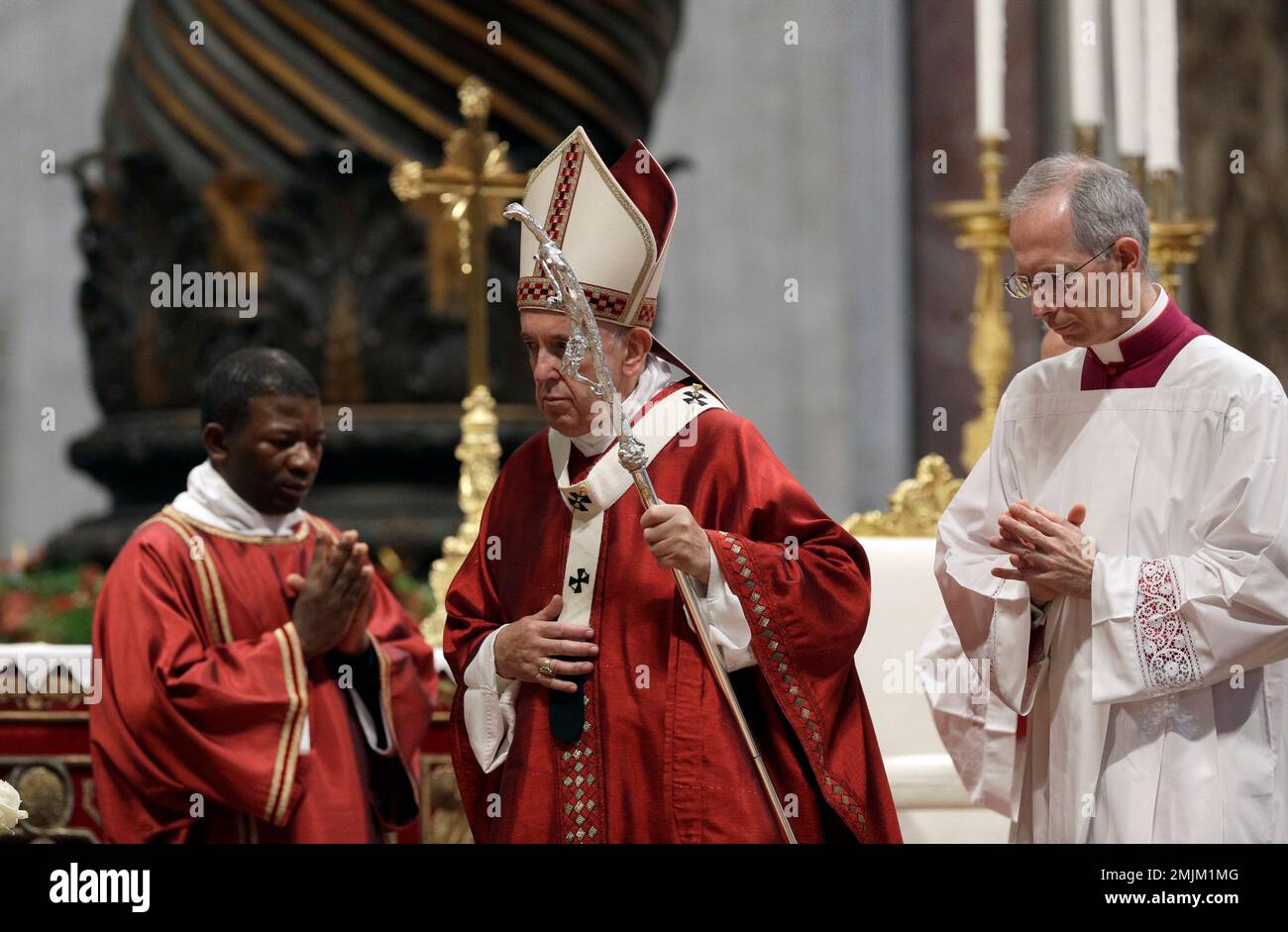 Pope Francis holds his pastoral staff as he celebrates Mass in St ...