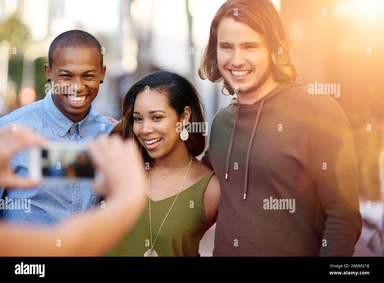 Snapshots of special moments. a group of young friends having their ...