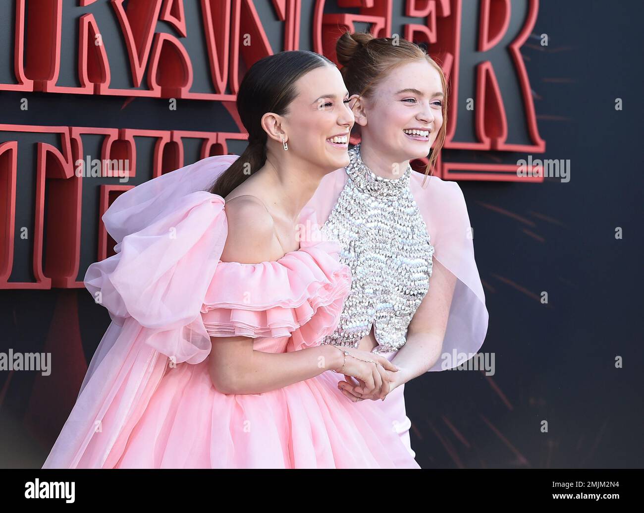 Millie Bobby Brown, left, and Sadie Sink arrive at the season three ...