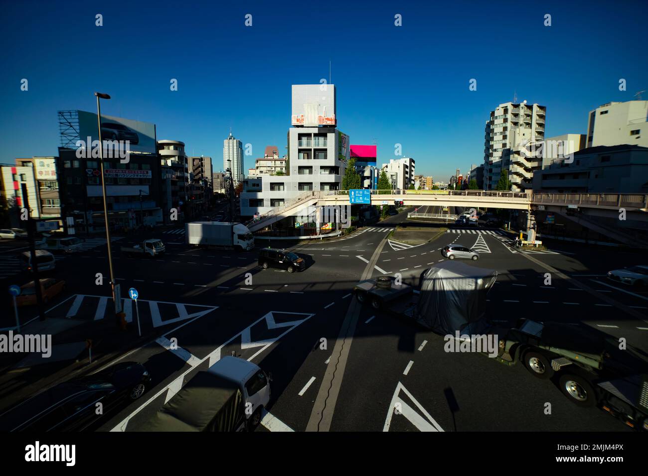 A traffic jam at the crossing in Tokyo wide shot Stock Photo - Alamy