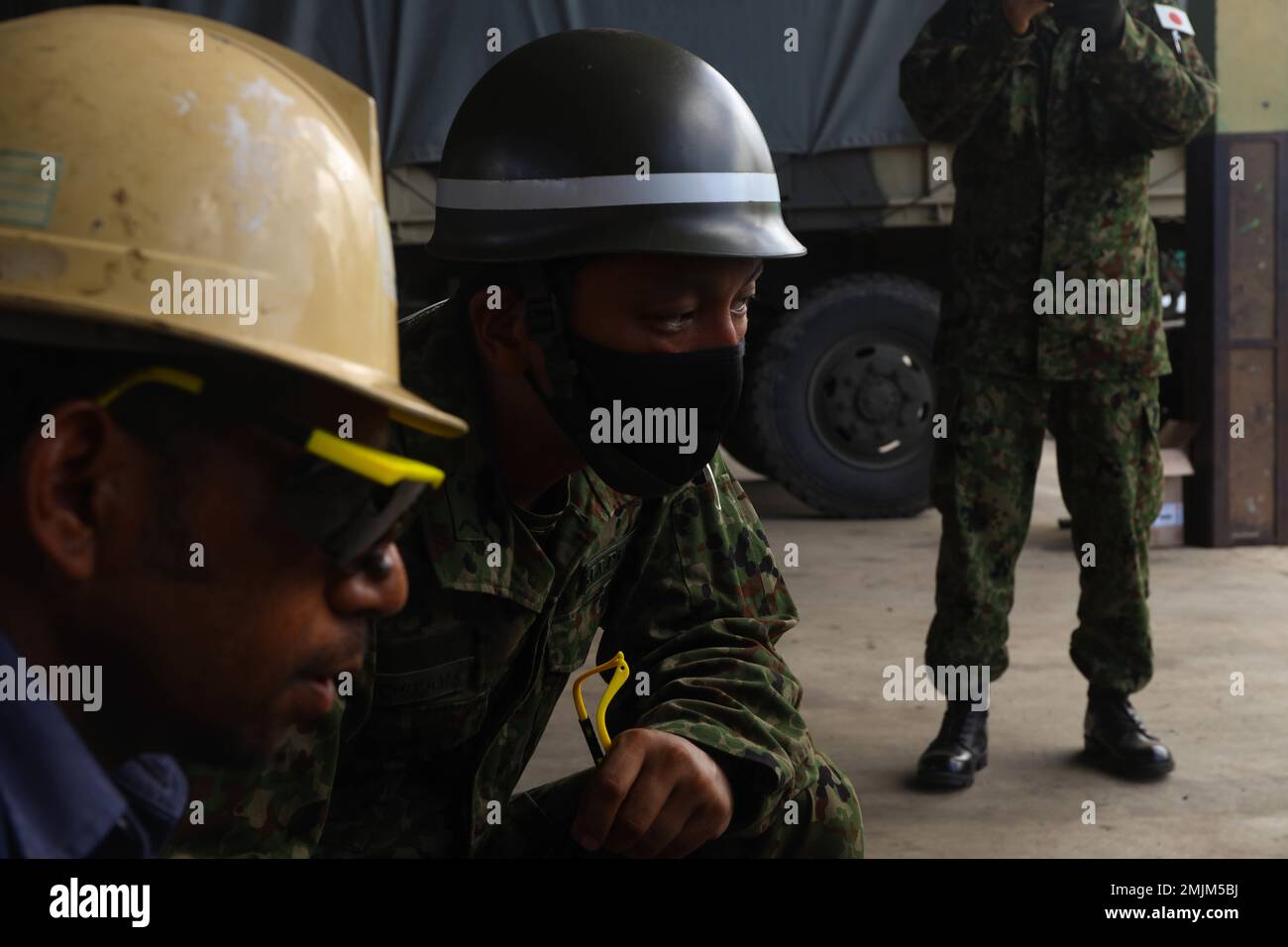 Japan Ground Self-Defense Force (JGSDF) Sgt. Yuji Uchiyama, an engineer ...
