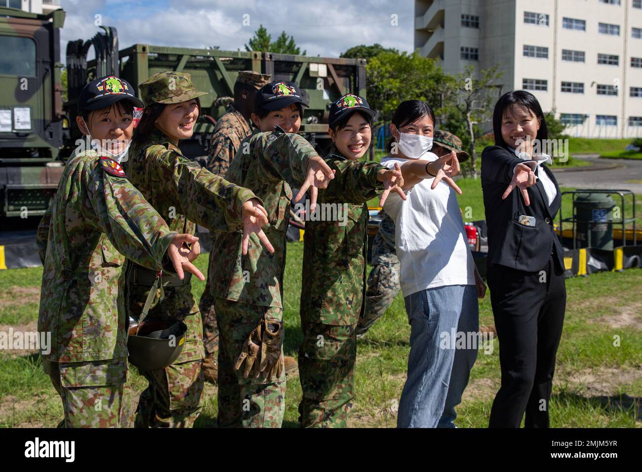 Japan Ground Self-Defense Force (JGSDF) members stand at the forward ...