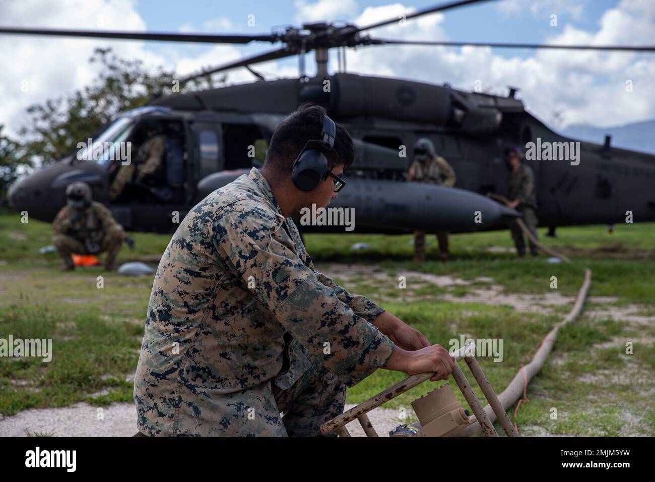 U.S. Marines with Marine Wing Support Squadron (MWSS) 171 refuel a ...