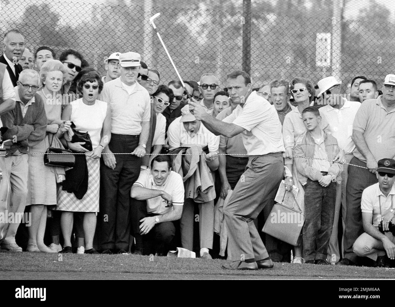 Arnie's Army gasps as Arnold Palmer misses a long putt that would have ...