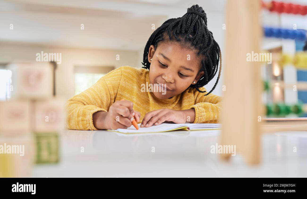 Education, girl and child writing at table for homework, lesson and ...