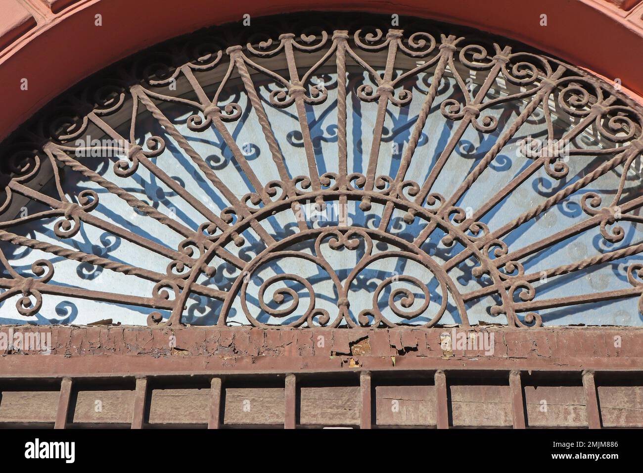 Wrought iron protector on a window of a house Stock Photo - Alamy