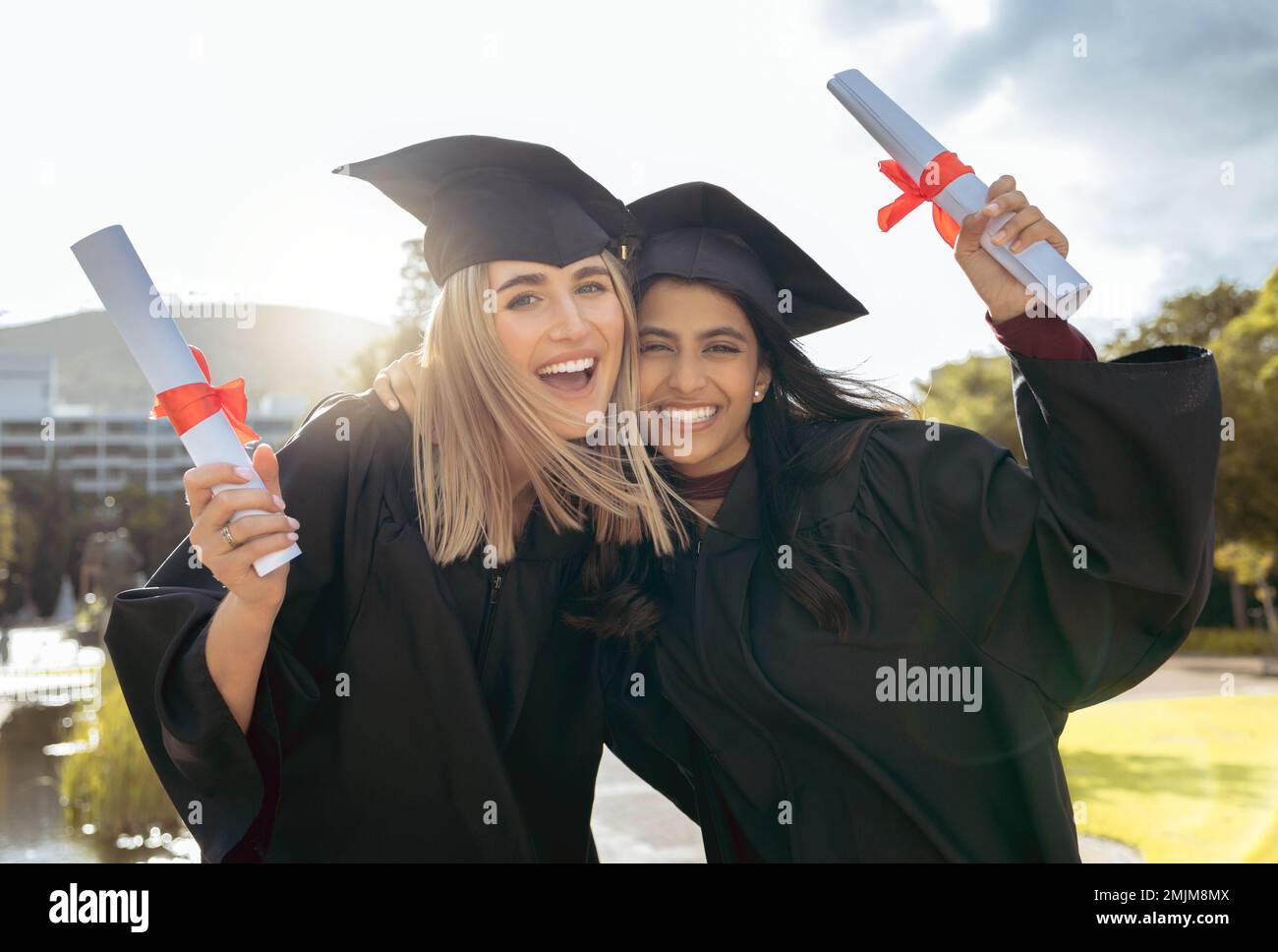 Certificate, friends and graduation portrait of women hug together at ...