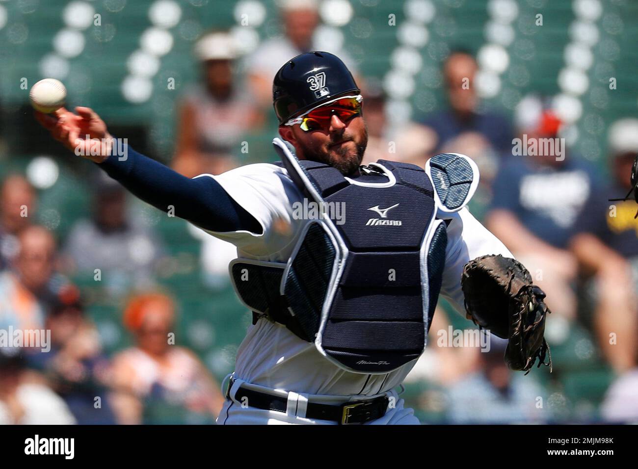 Detroit Tigers catcher Bobby Wilson throws to first base for an out on ...