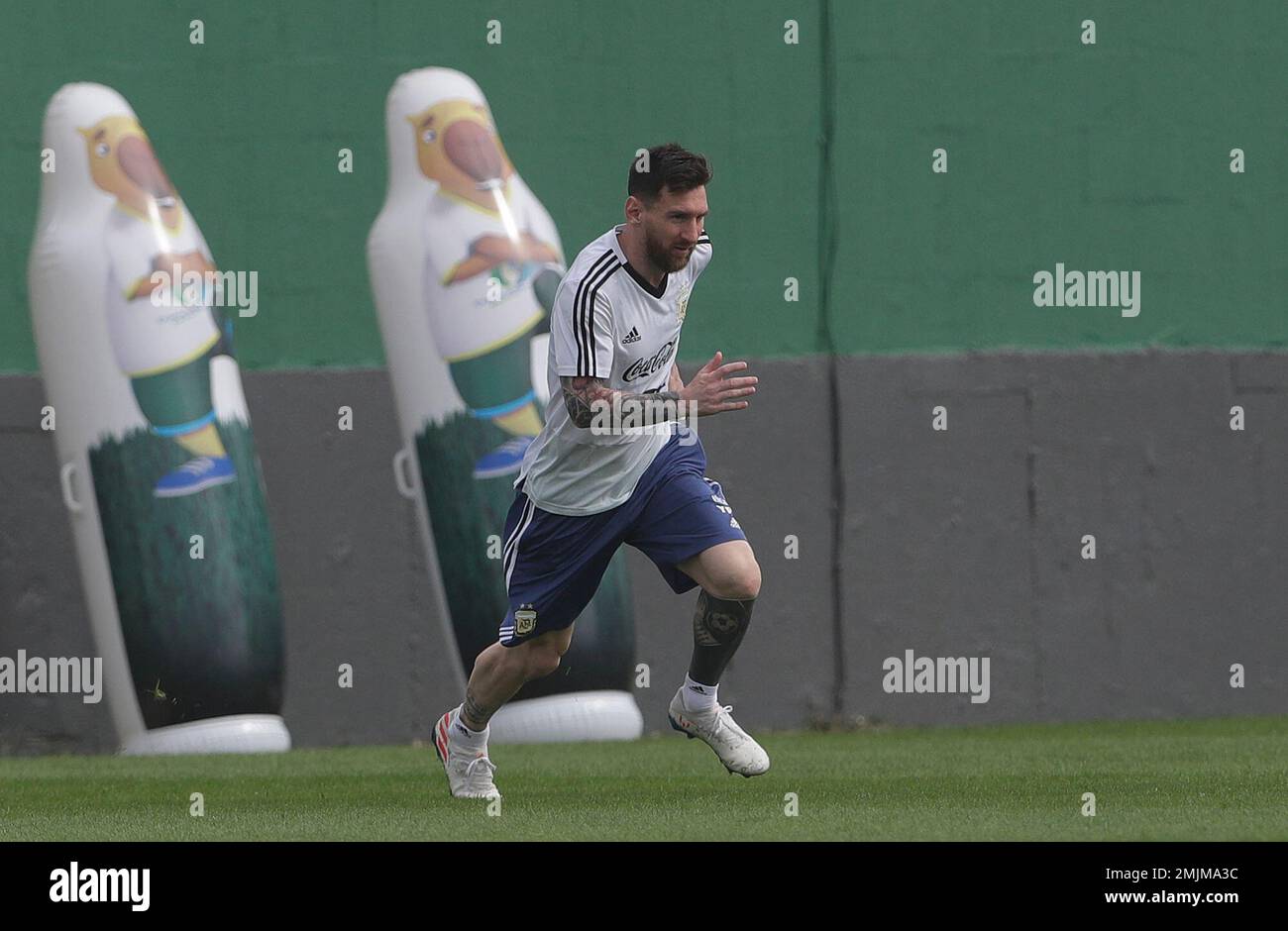 Argentina's Lionel Messi warms up during a practice session in Rio de ...