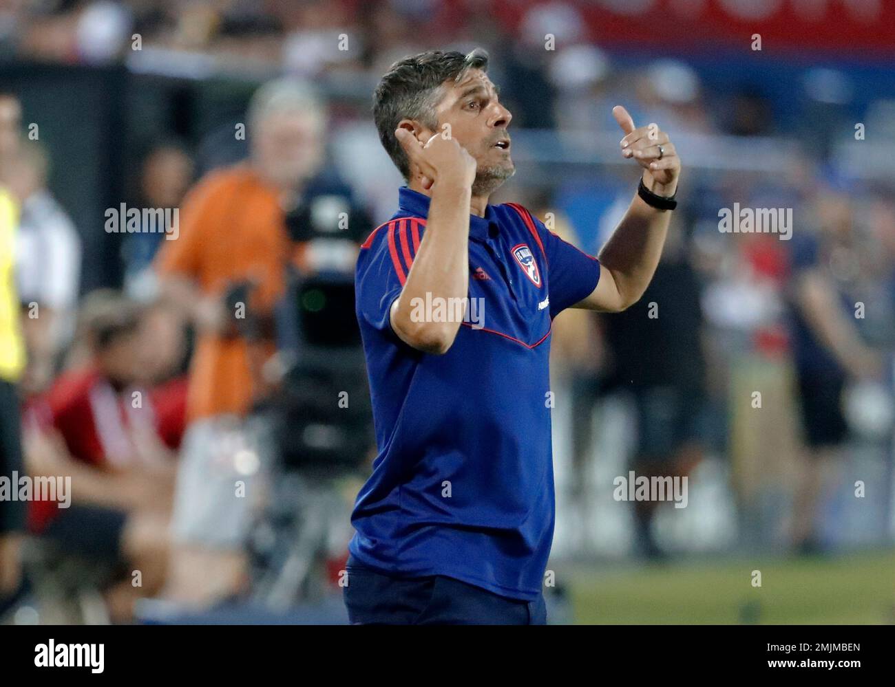 FC Dallas head coach Luchi Gonzalez instructs his team in the first ...